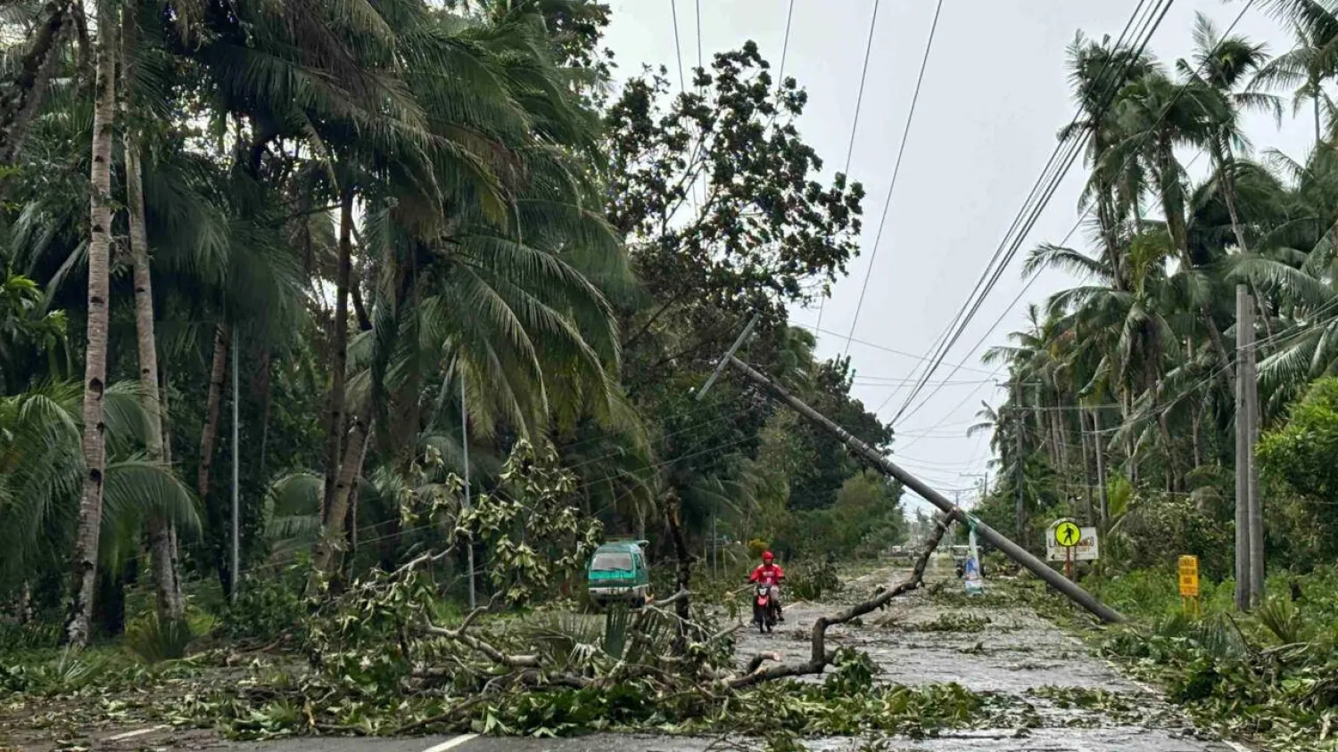 Floods Strand People on Roofs as Typhoon Pounds Philippines – Sudan Events